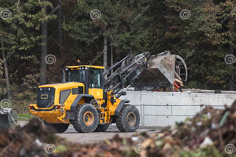 Skid Steer Loader Moving Garbage at the Landfill Site Stock Image ...