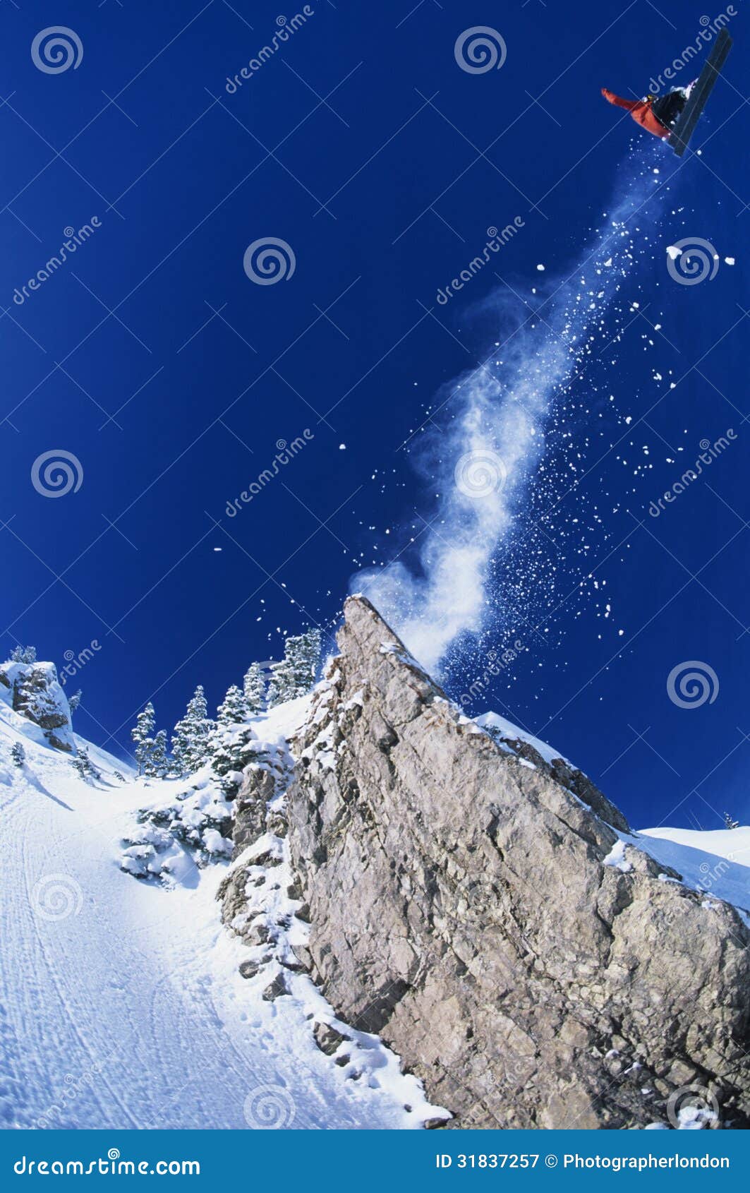 Skier Jumping from Mountain Ledge Stock Image - Image of outdoors ...