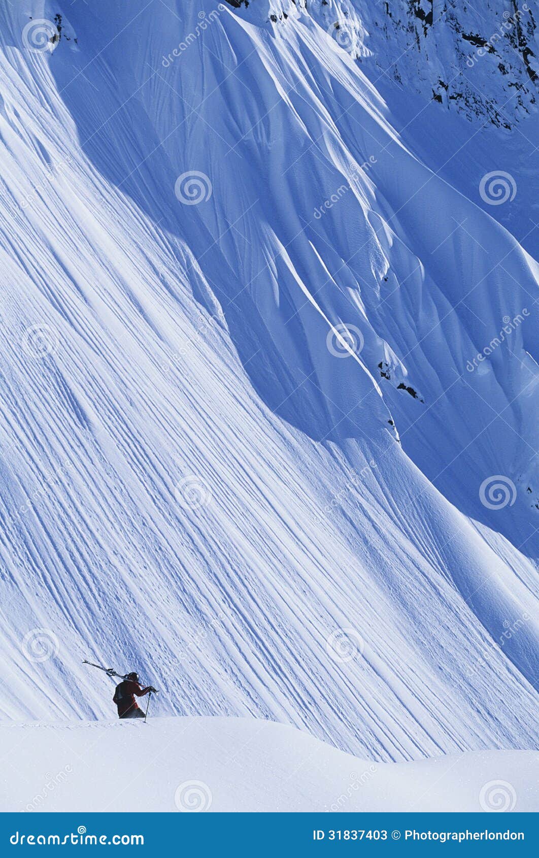 Skier on Mountain Slope stock image. Image of hobbies - 31837403