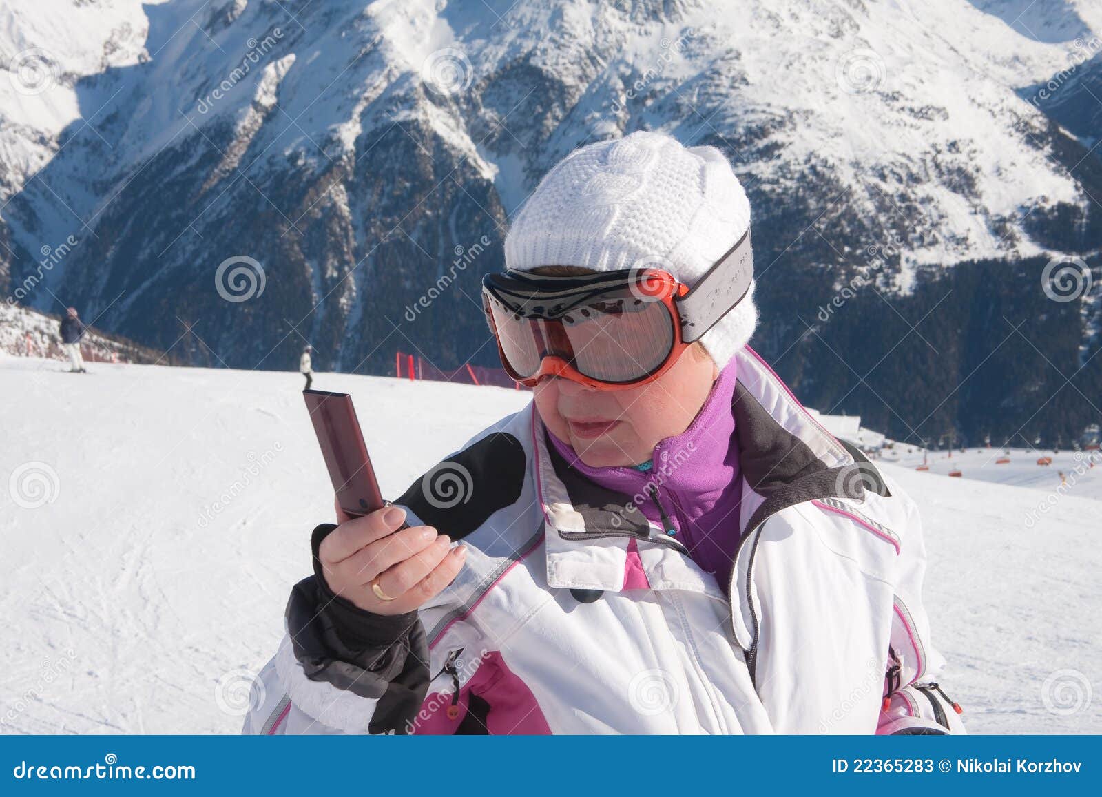 Skier in the Mountains with a Mobile Phone Stock Image - Image of snow ...