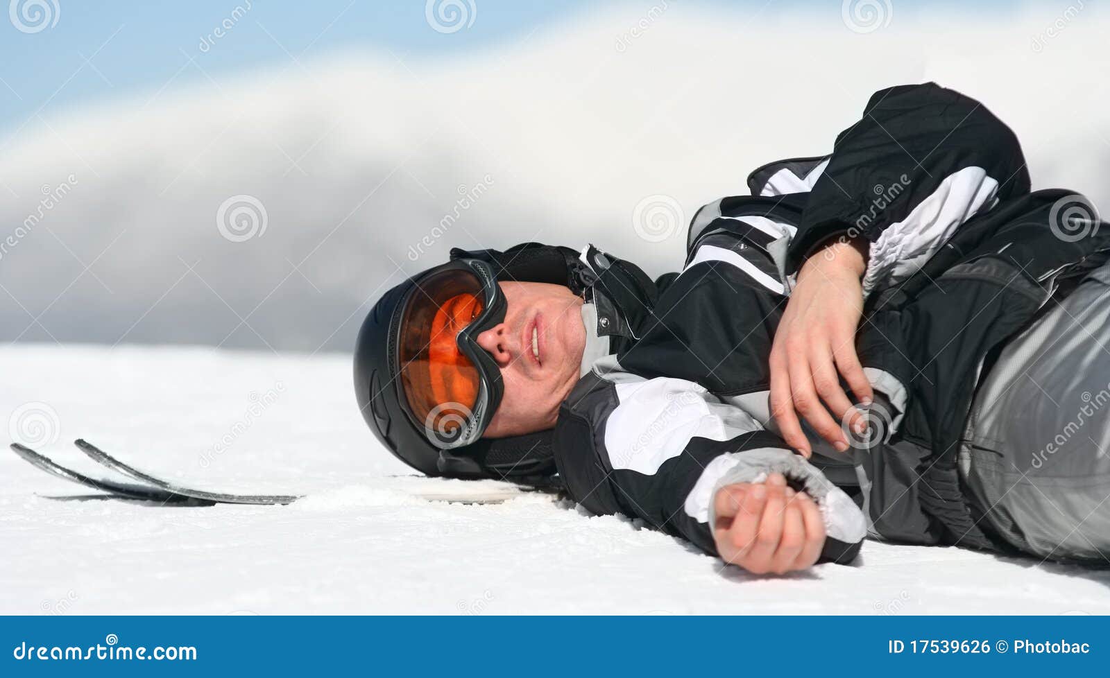 Skier relaxing on snow stock photo. Image of high, adult - 17539626