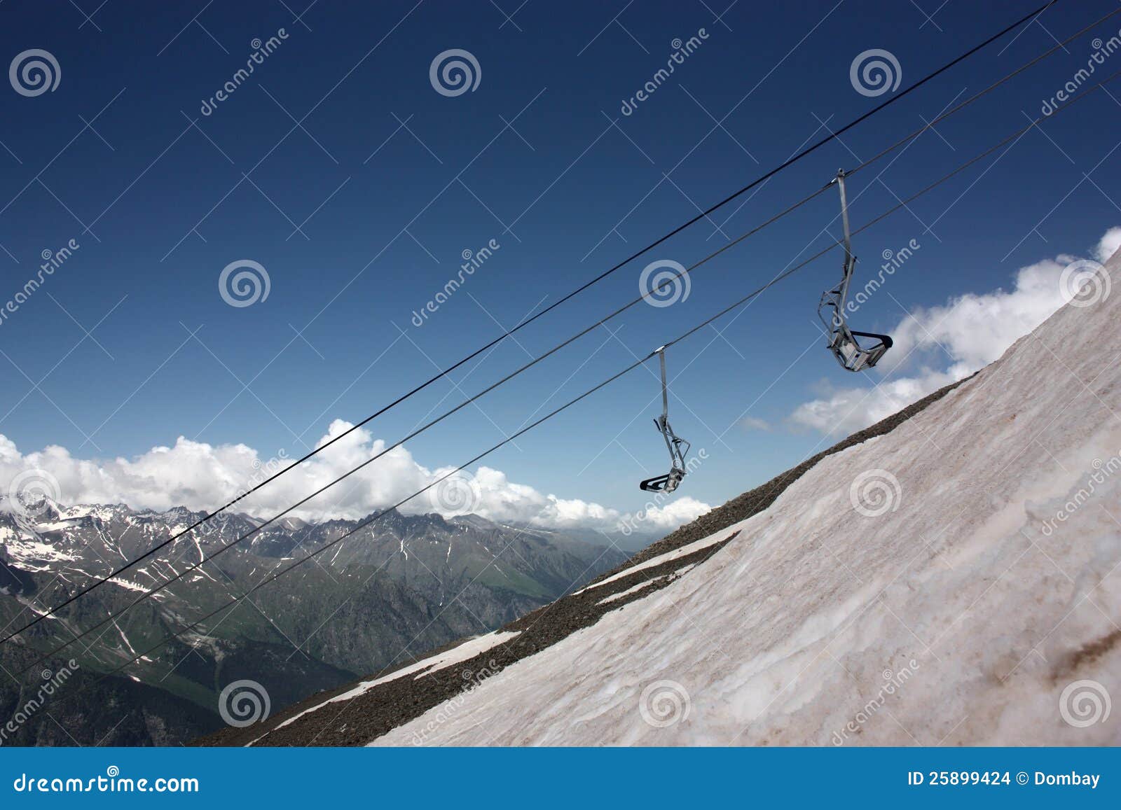 Skier on the ski lift stock photo. Image of downhill - 25899424