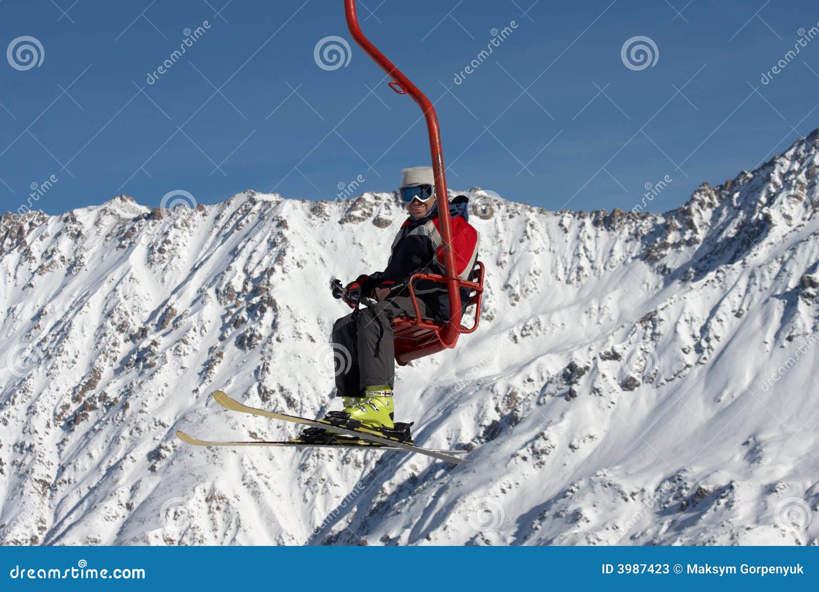 Skier on ski lift stock image. Image of transportation - 3987423
