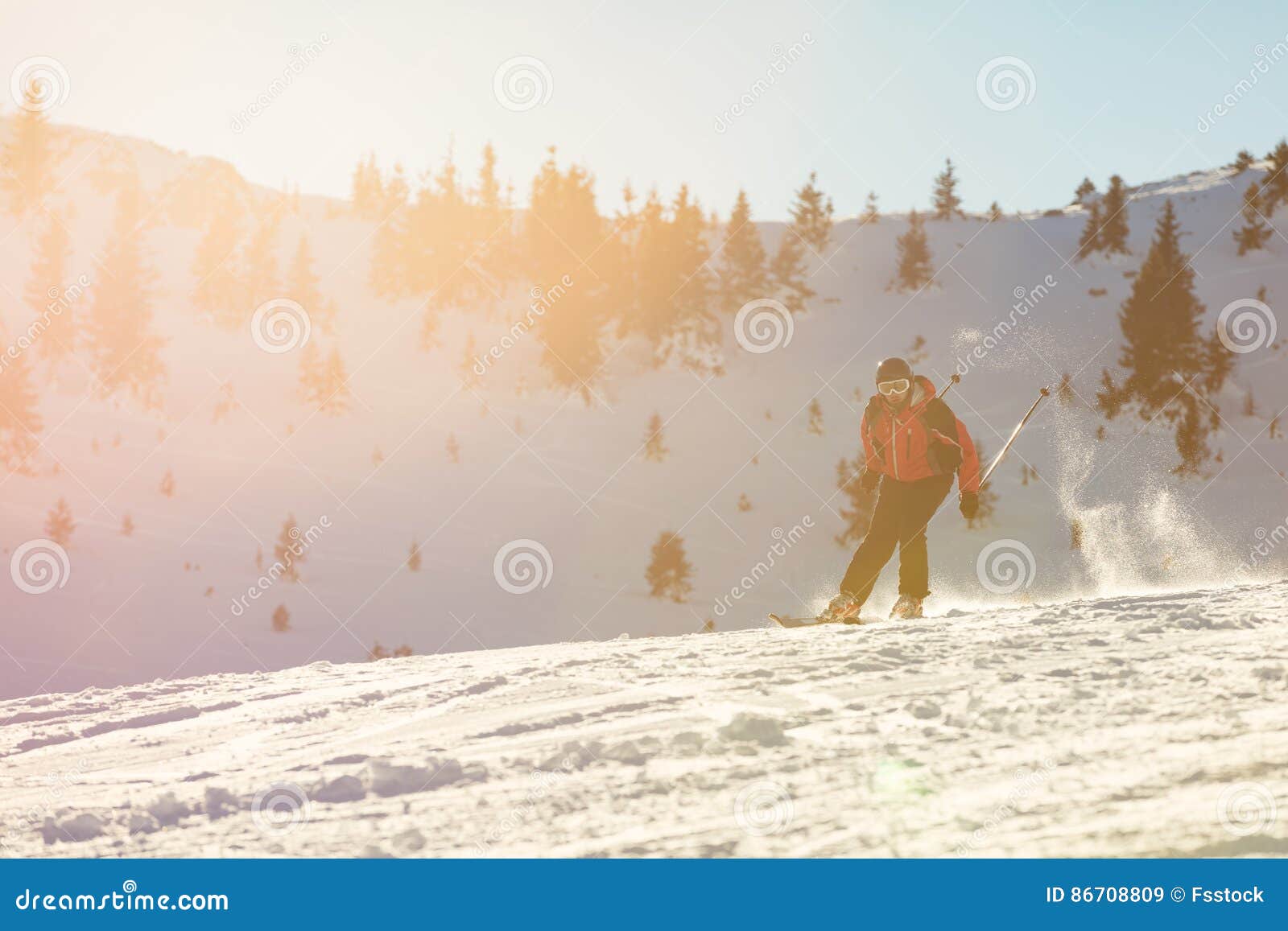 Skier Skiing Downhill in High Mountains Against Sunset Stock Image ...