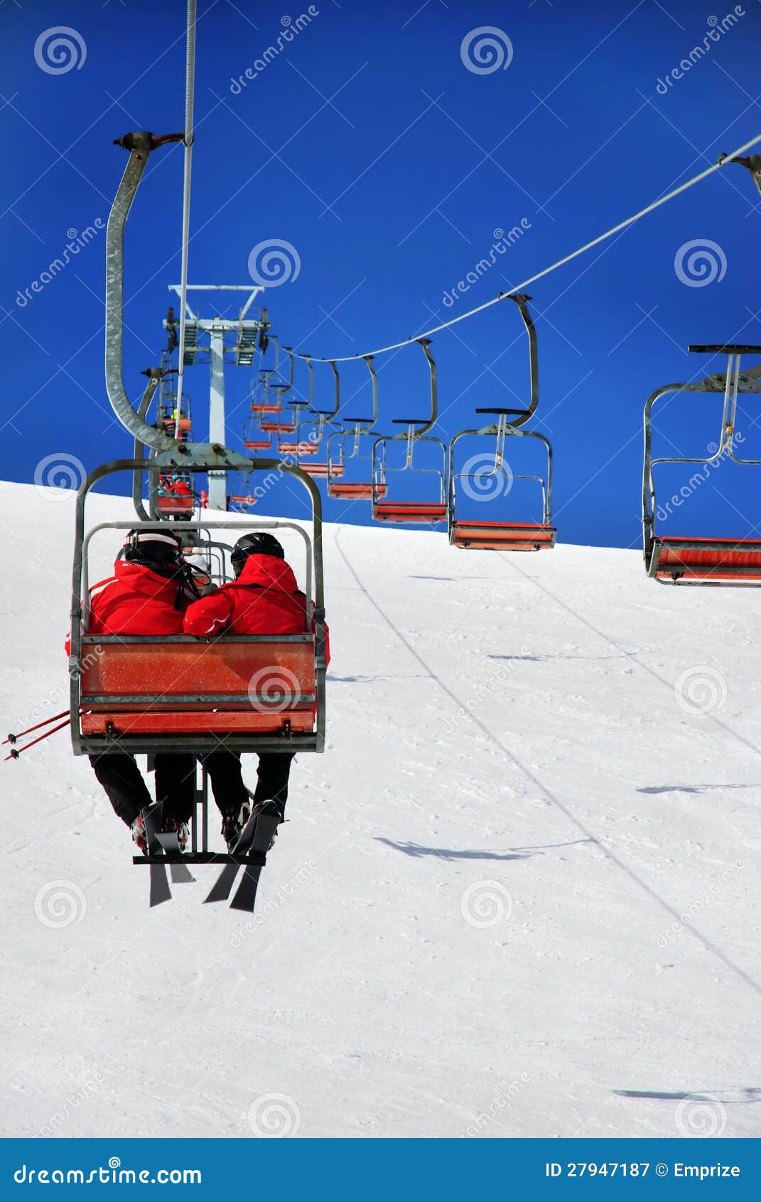 Skiers on a ski lift stock image. Image of happy, mountain - 27947187