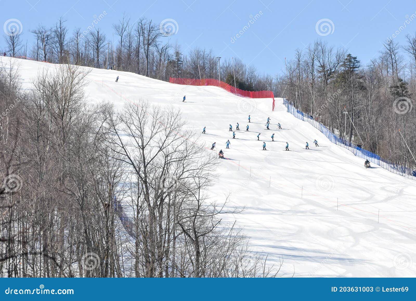 Skiers and Snowboarders Going Down the Slope Stock Image - Image of ...