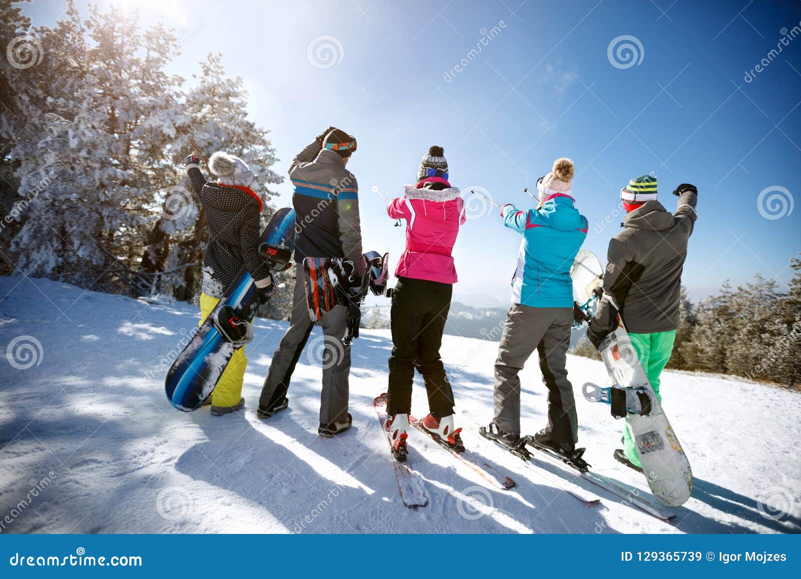 Skiers on the Top of the Mountain, Back View Stock Image - Image of ...