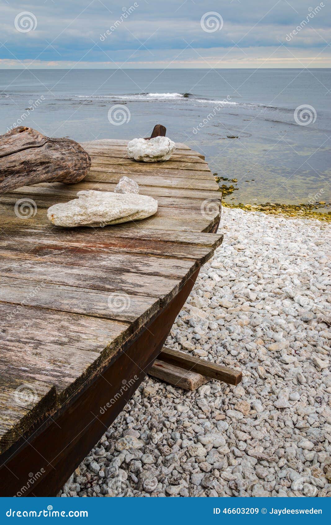 Skiff Boat on Stone Beach by the Ocean Stock Image - Image of nature ...
