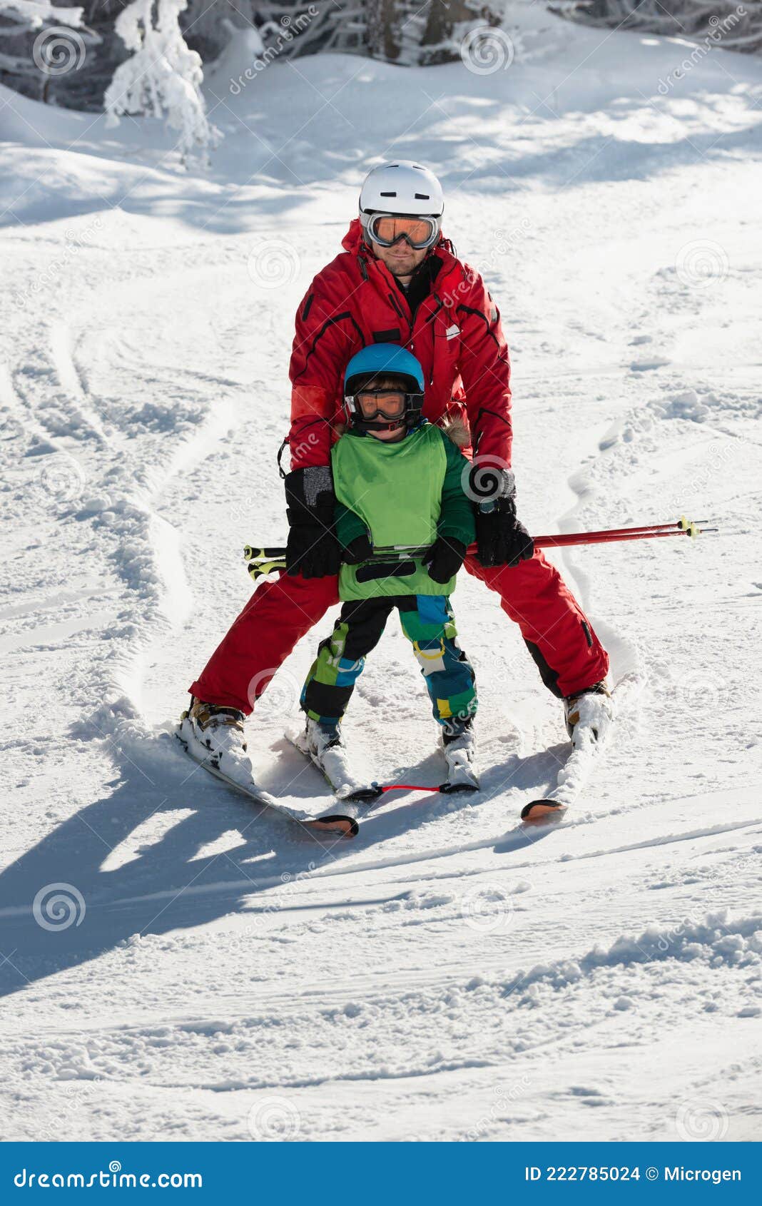 Skiing together stock photo. Image of nature, family - 222785024
