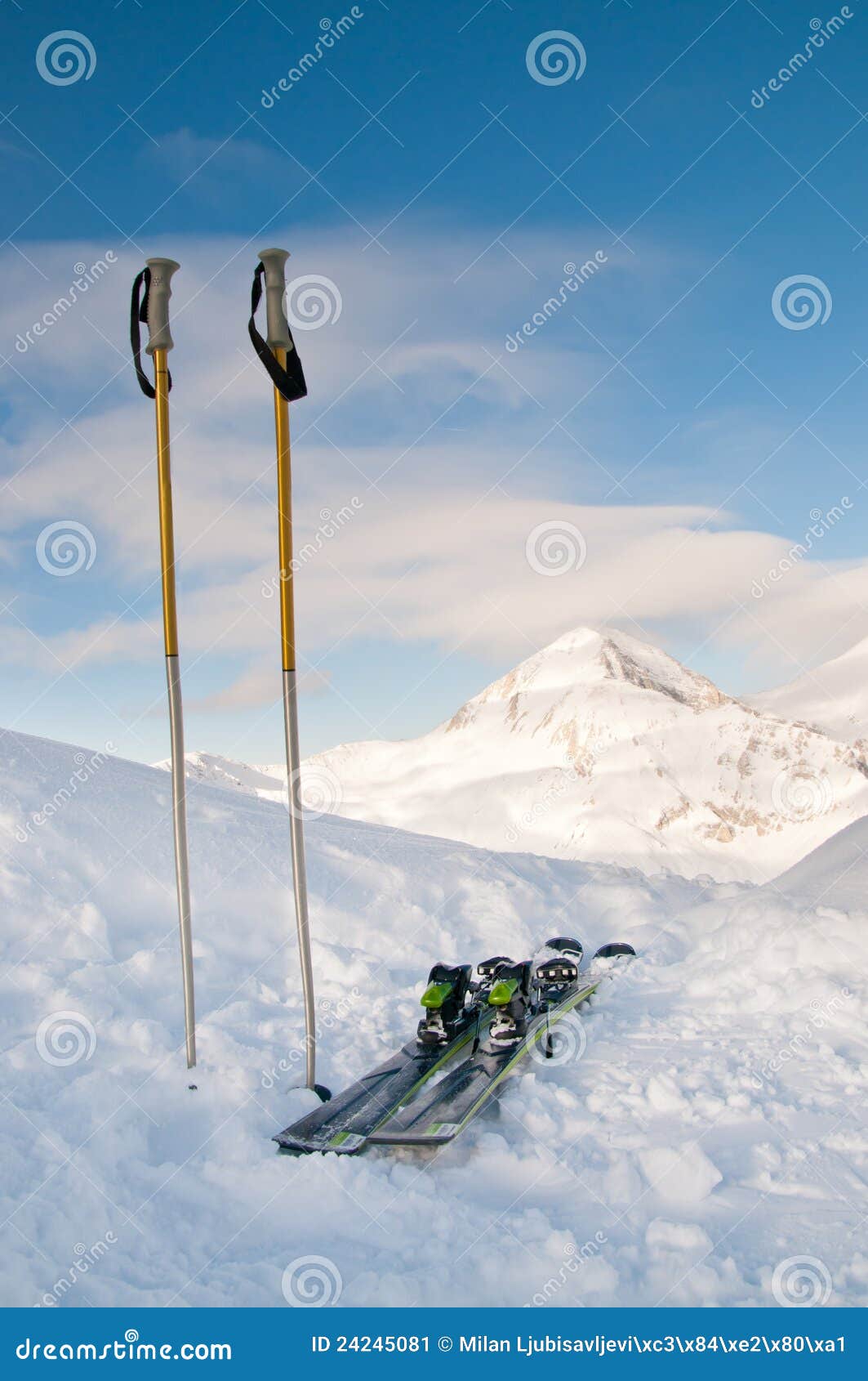 Skiis and Mountain Snowy Peak Stock Image - Image of cloud, white: 24245081