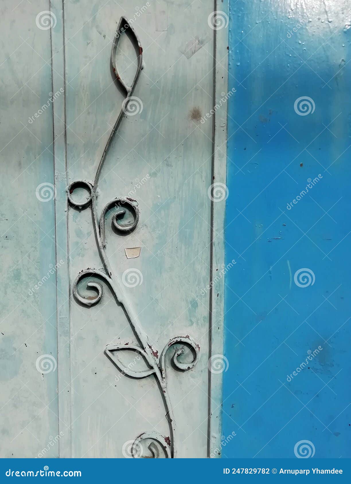 Blue Iron Door with Leaf Pattern. Stock Photo - Image of shows, door ...