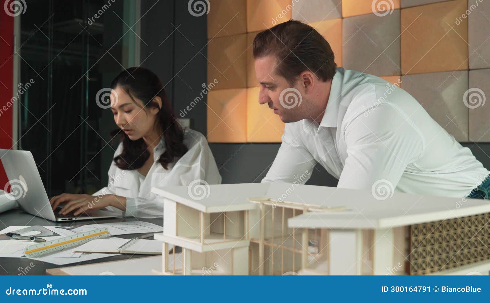 Skilled Architect Engineer Working Together To Drawing House Plan ...