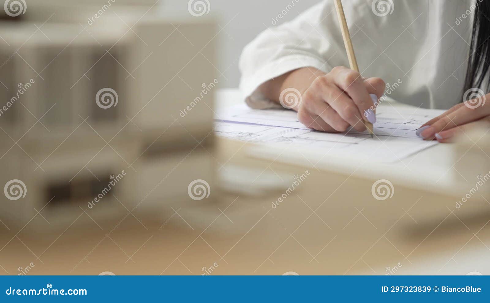 Skilled Architect Hand Writing Blueprint while Pointing House Model ...