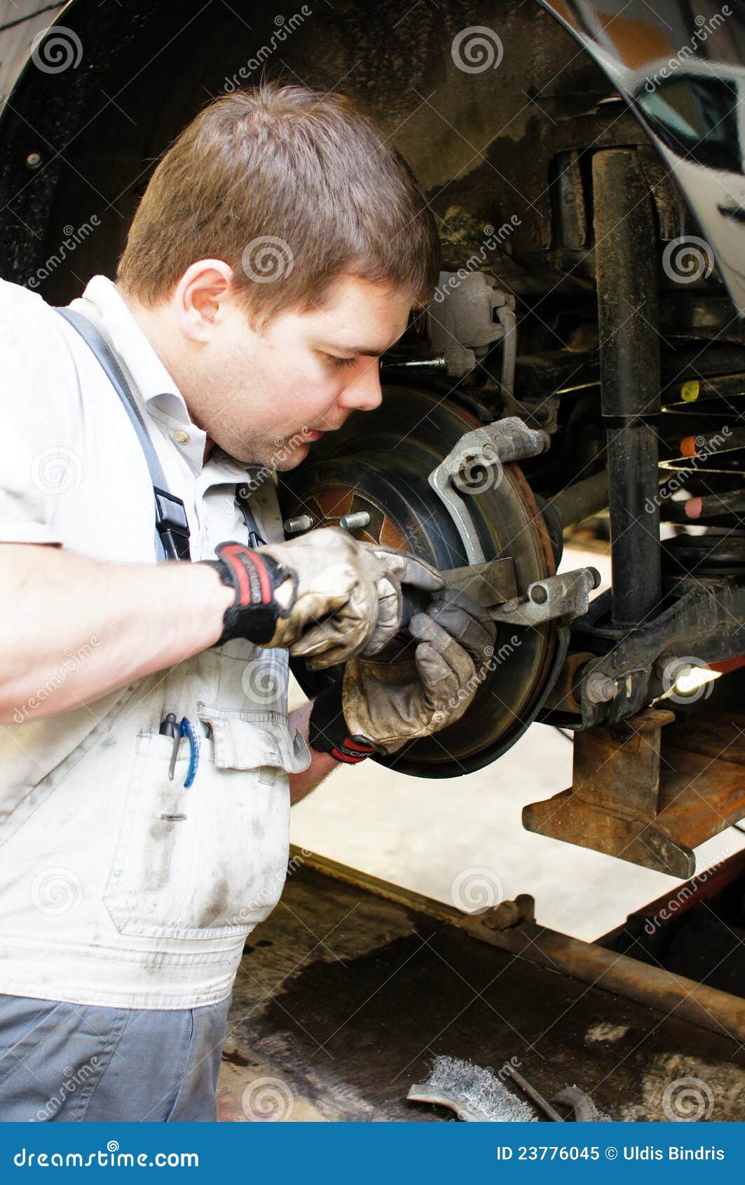 Skilled auto mechanic stock image. Image of opening, brake - 23776045