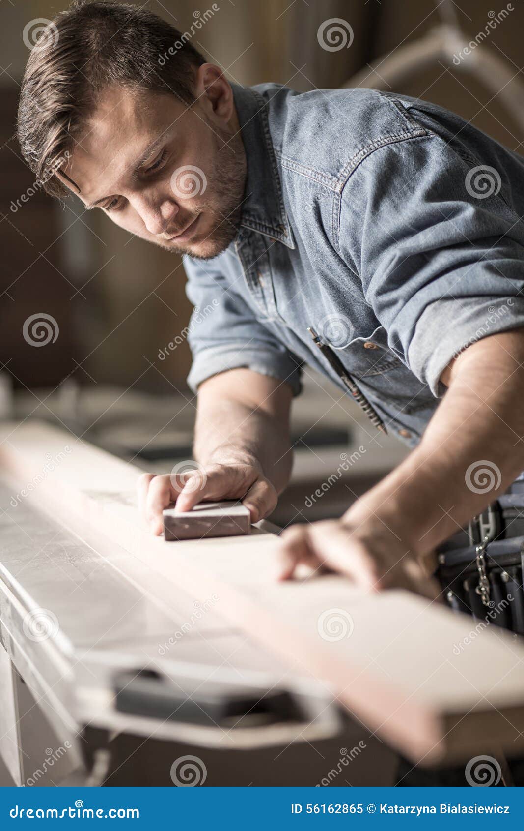 Carpenter Working With Meter Or Rule Taking Measures On Wood Using ...