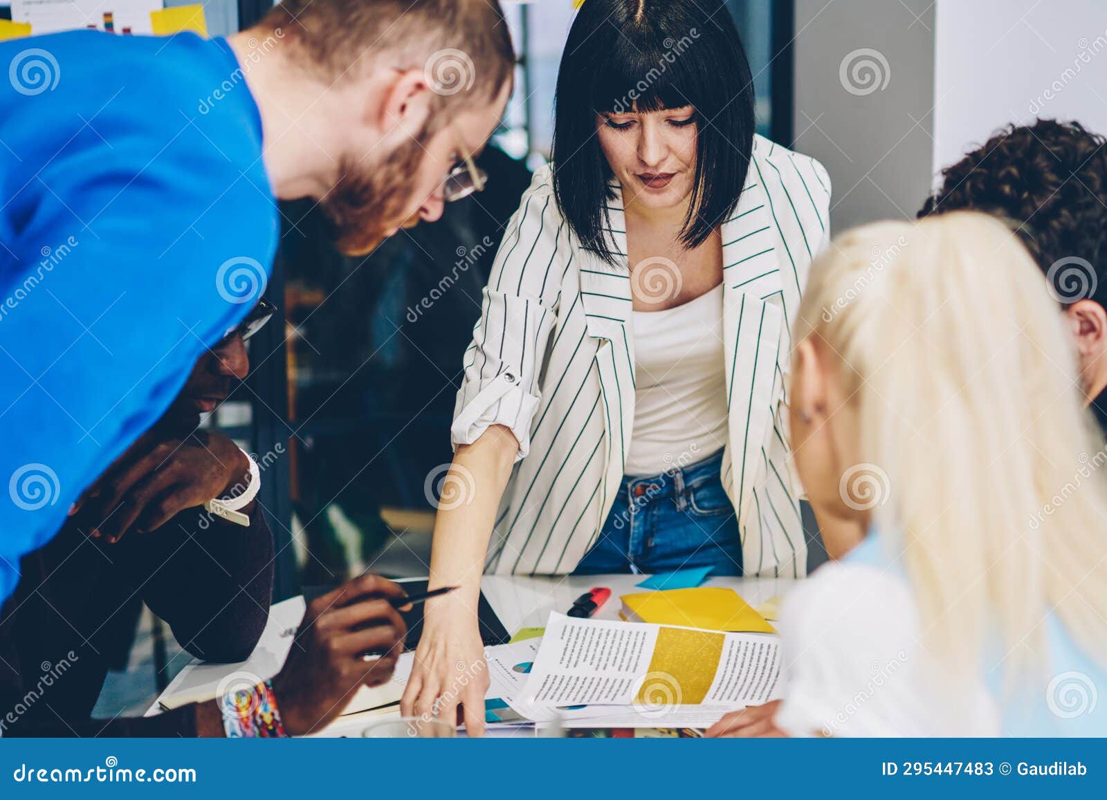 Skilled Diversity Crew Checking Business Plan on Meeting Table Stock ...
