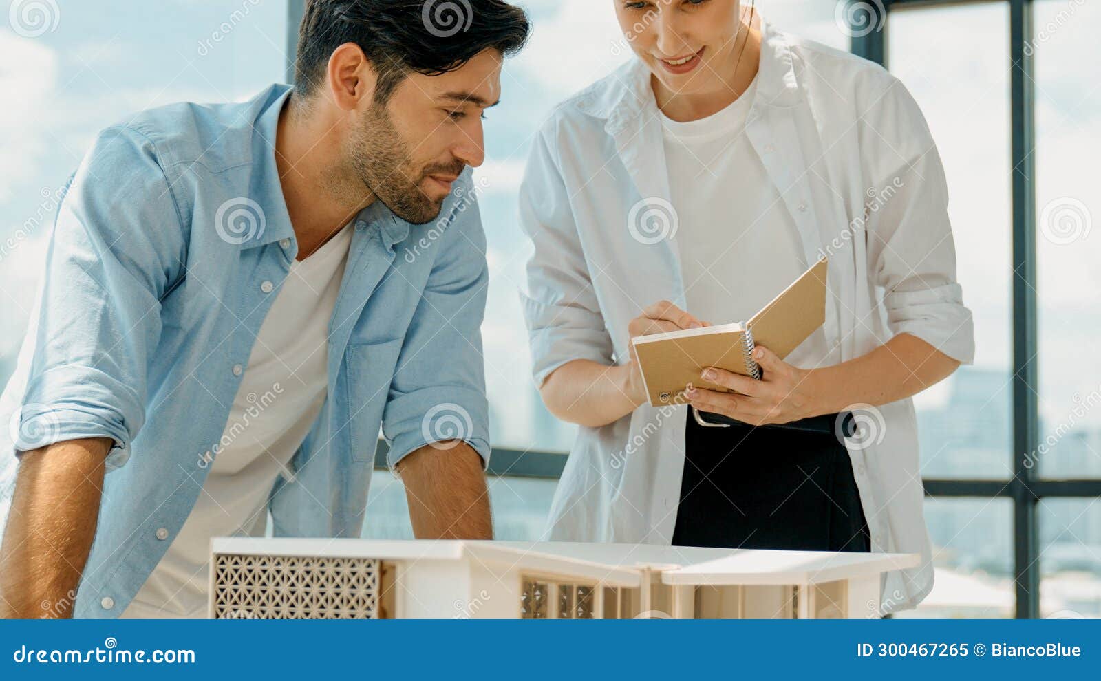 Skilled Engineer Team Discussion about House Model Construction ...