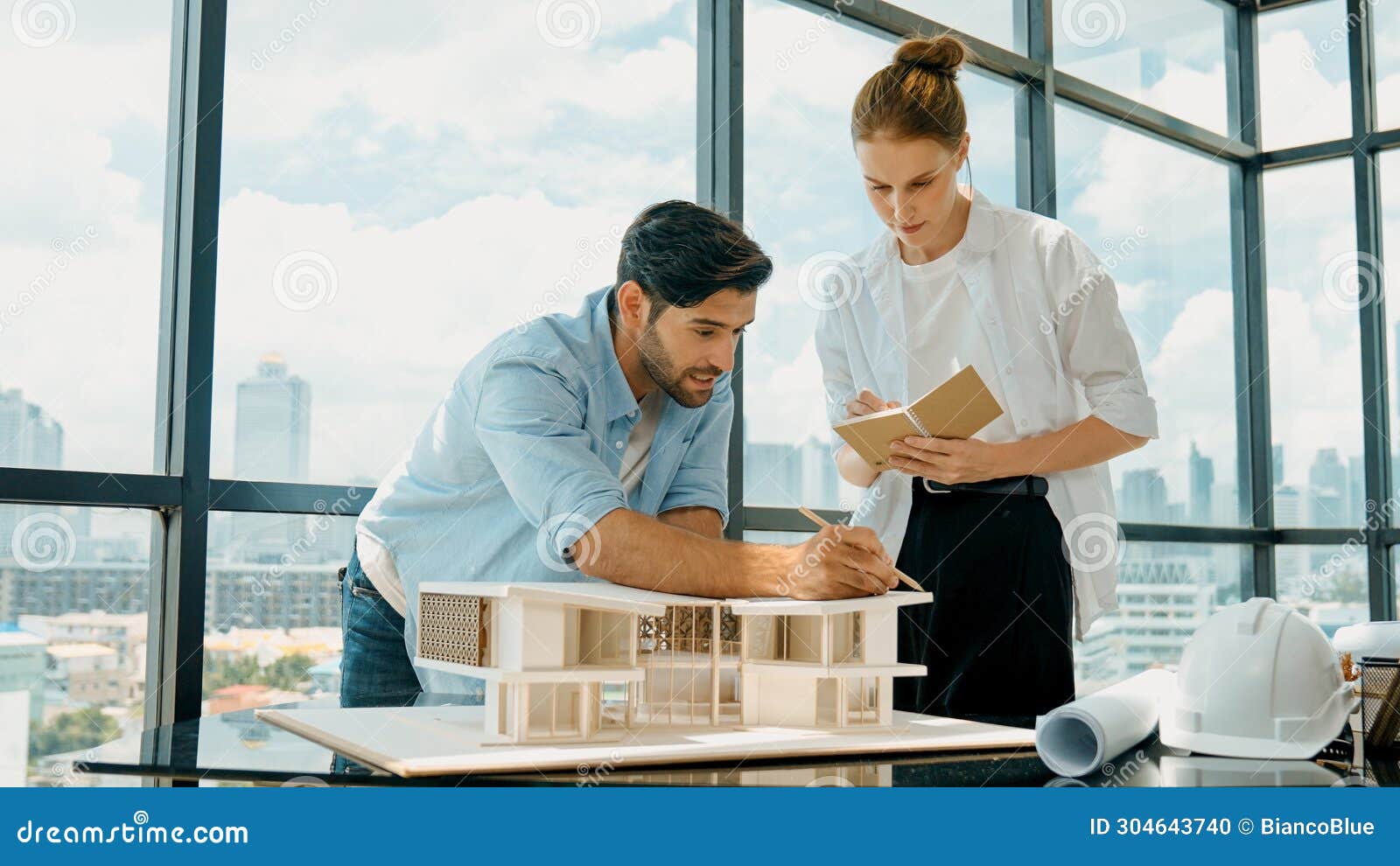 Skilled Engineer Team Discussion about House Model Construction ...