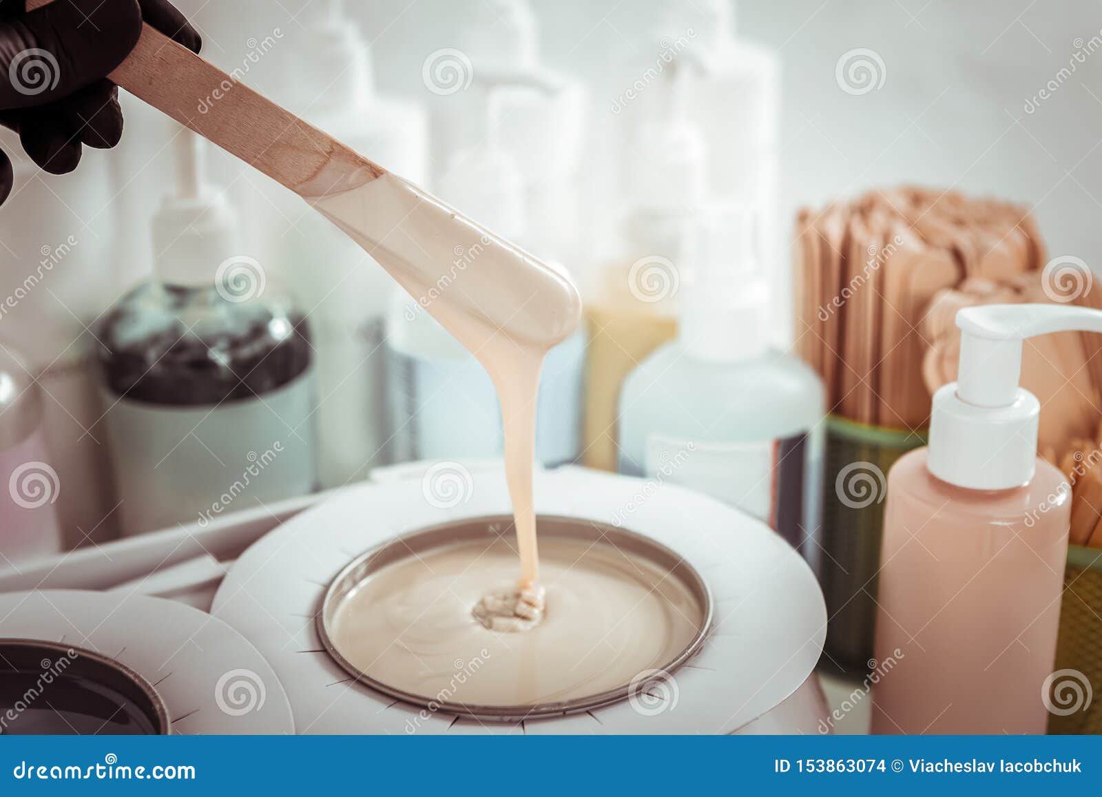 Skilled Master Mixing Light Wax in Heating Container Stock Photo ...