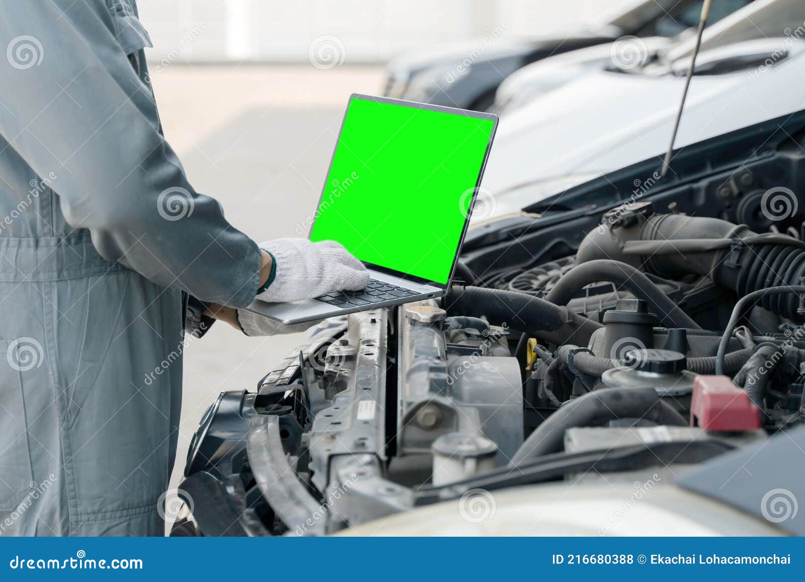 Mechanic Using a Laptop Computer Green Screen To Check Collect ...