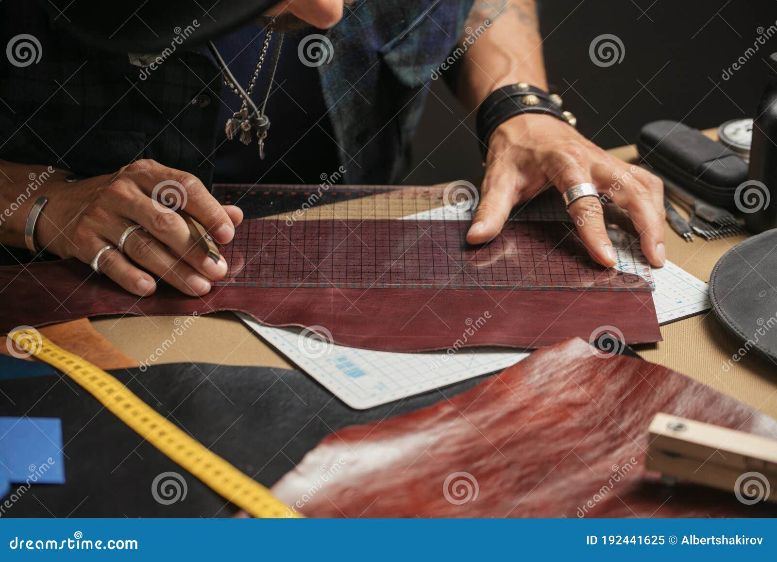 Close Up of a Shoemaker Working with Leather Textile and Hammer at a ...