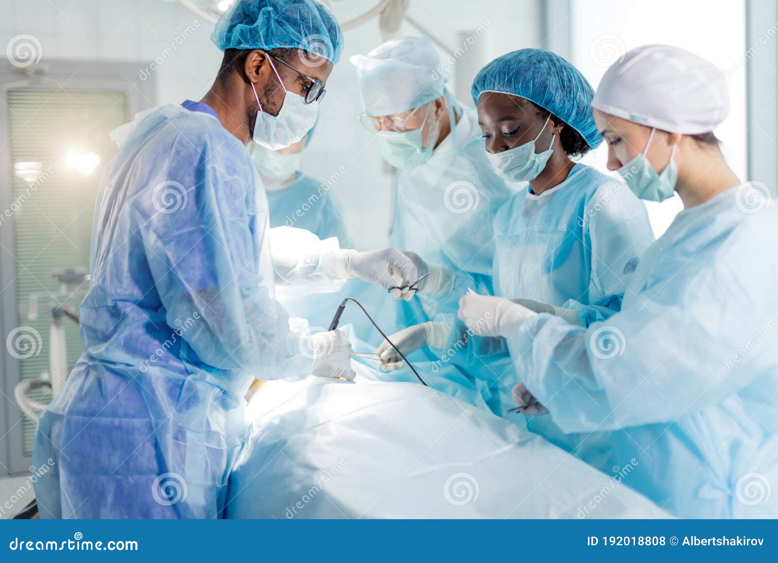 Skilled and Registered Doctors Doing Medical Procedure Stock Photo ...