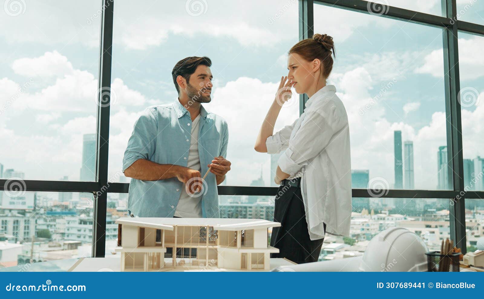 Skilled Architect Team Discussion about House Model Construction ...