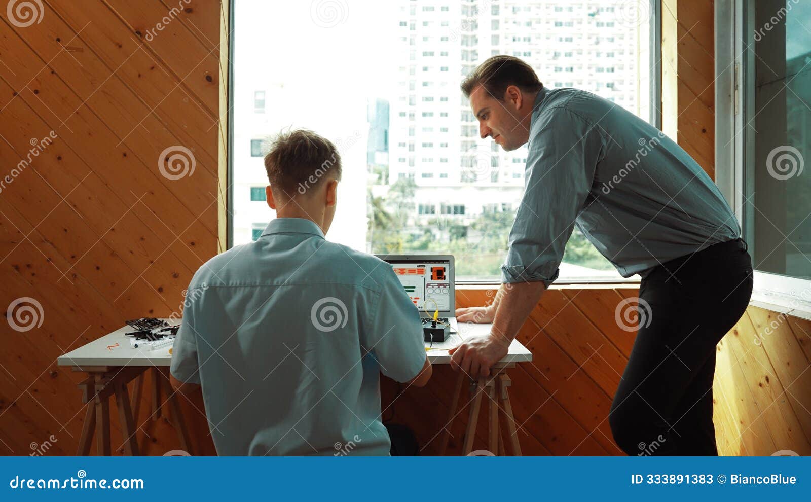 Skilled Teacher Look Young Student Fixing Car Model at STEM Class ...