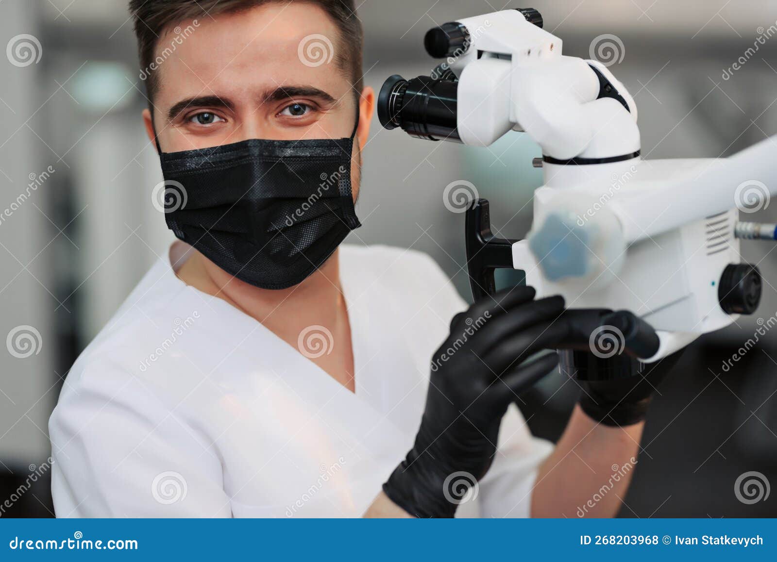 Skilled User. Handsome Young Male Dentist Looking into the Lens of a ...