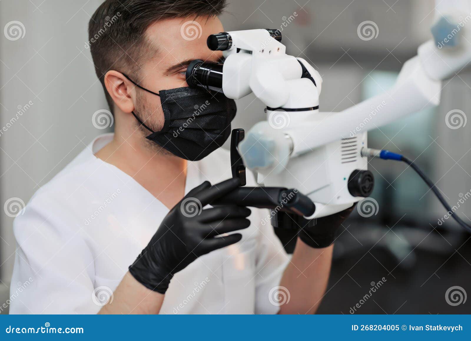 Skilled User. Handsome Young Male Dentist Looking into the Lens of a ...