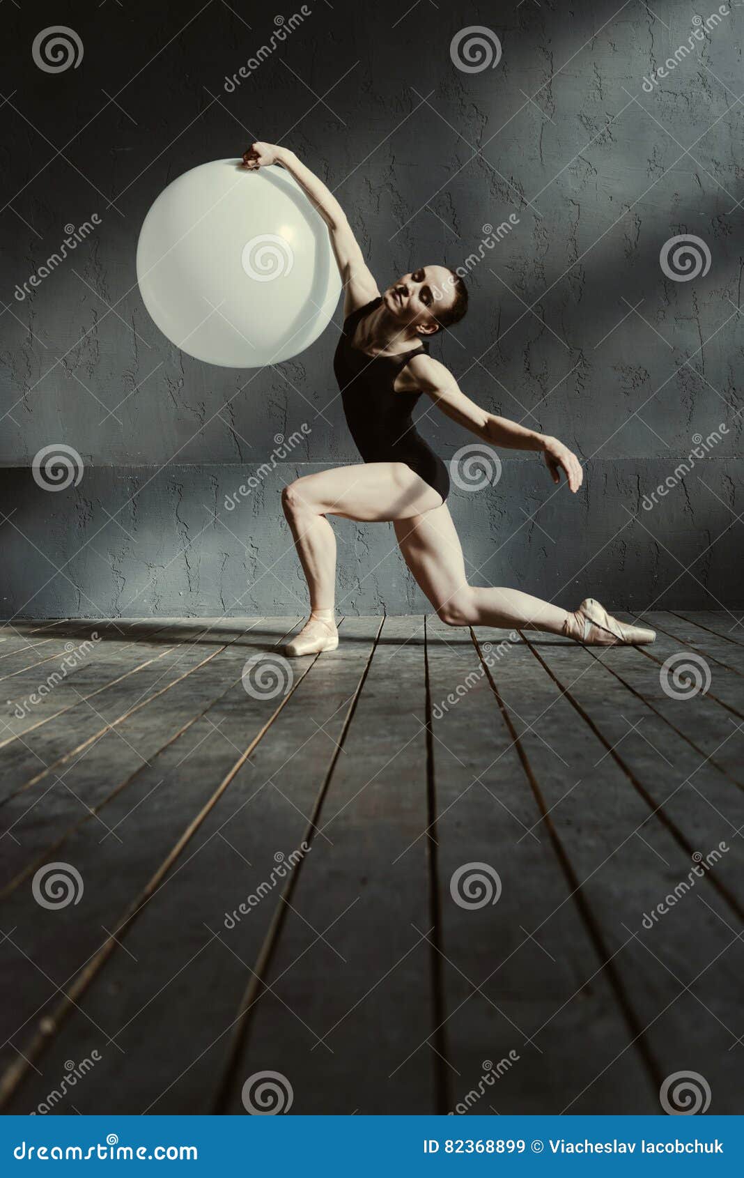 Skilled Young Gymnast Performing Using the White Balloon Stock Image ...