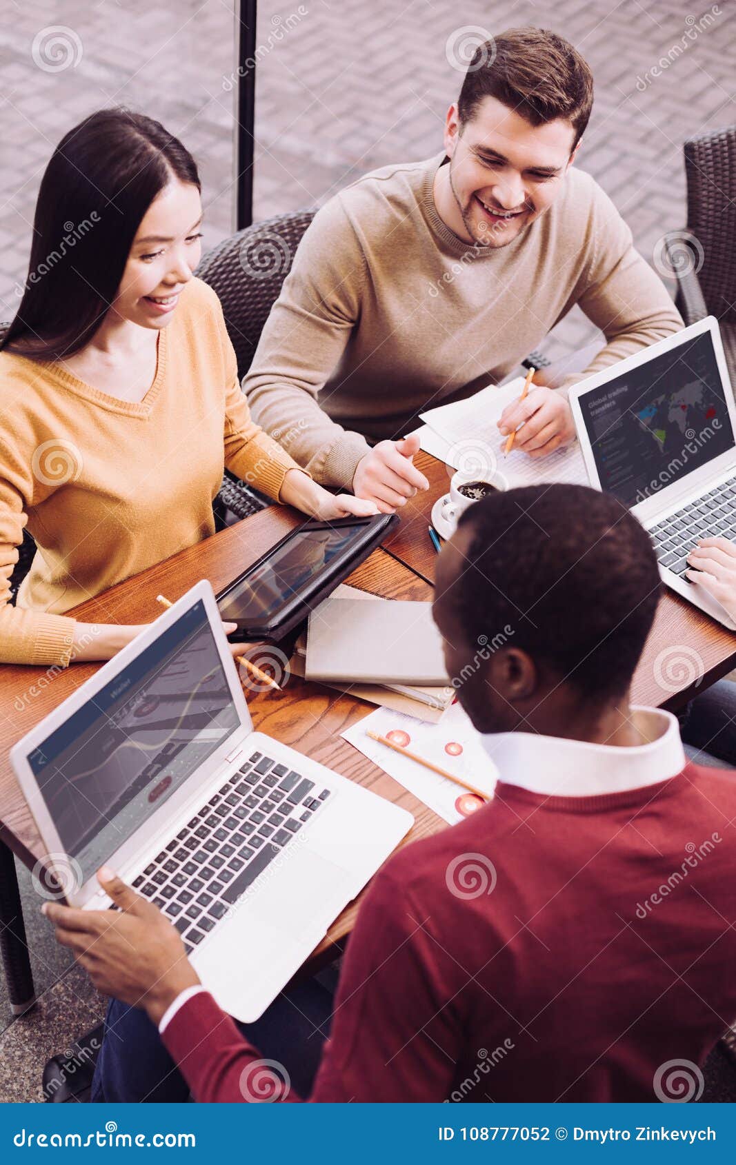 Skillful Ambitious Colleagues Using Technology for Working Stock Photo ...