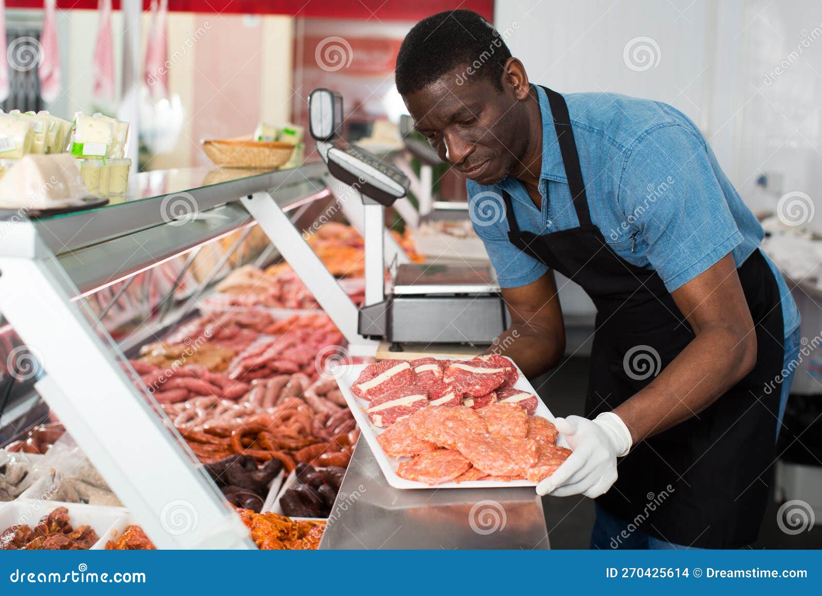 Butcher Working Behind Counter Stock Photo - Image of activity ...