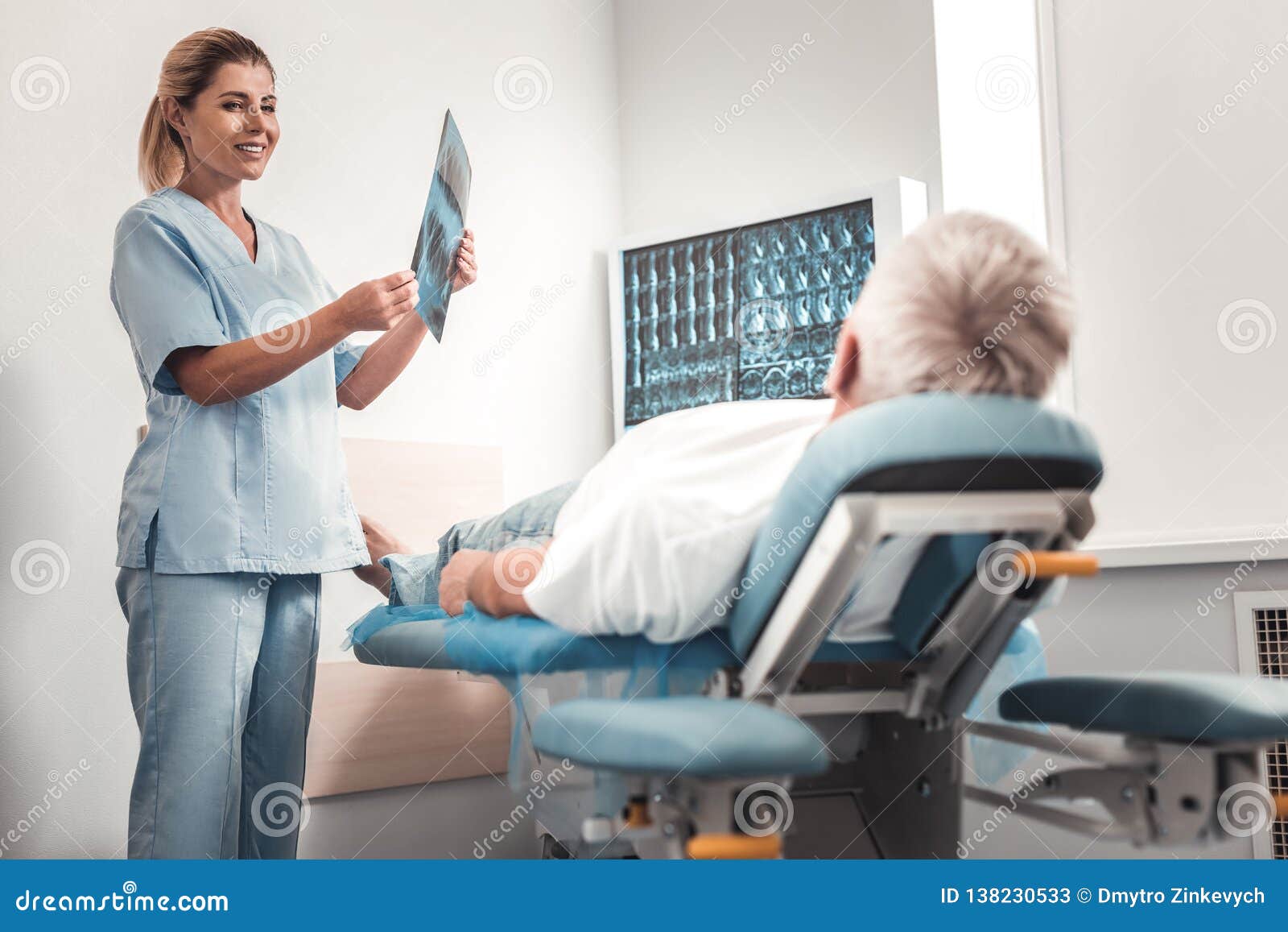 Skillful Chiropractor Doing Leg Roentgen Stock Image - Image of clinic ...