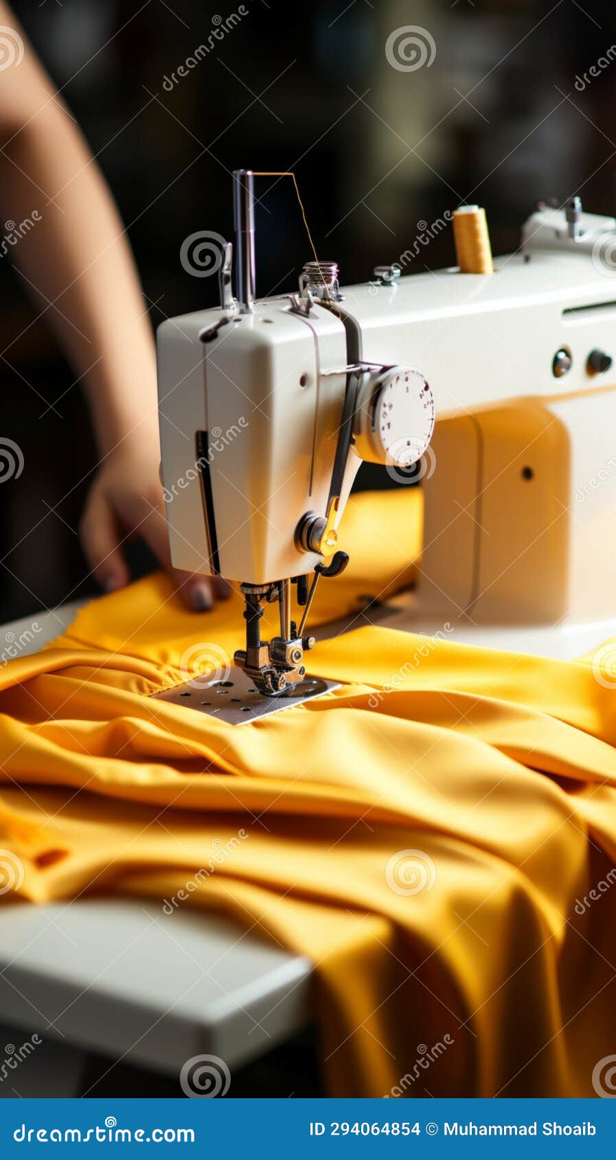 Skillful Female Hands Work On A Modern Sewing Machine, Stitching Yellow ...