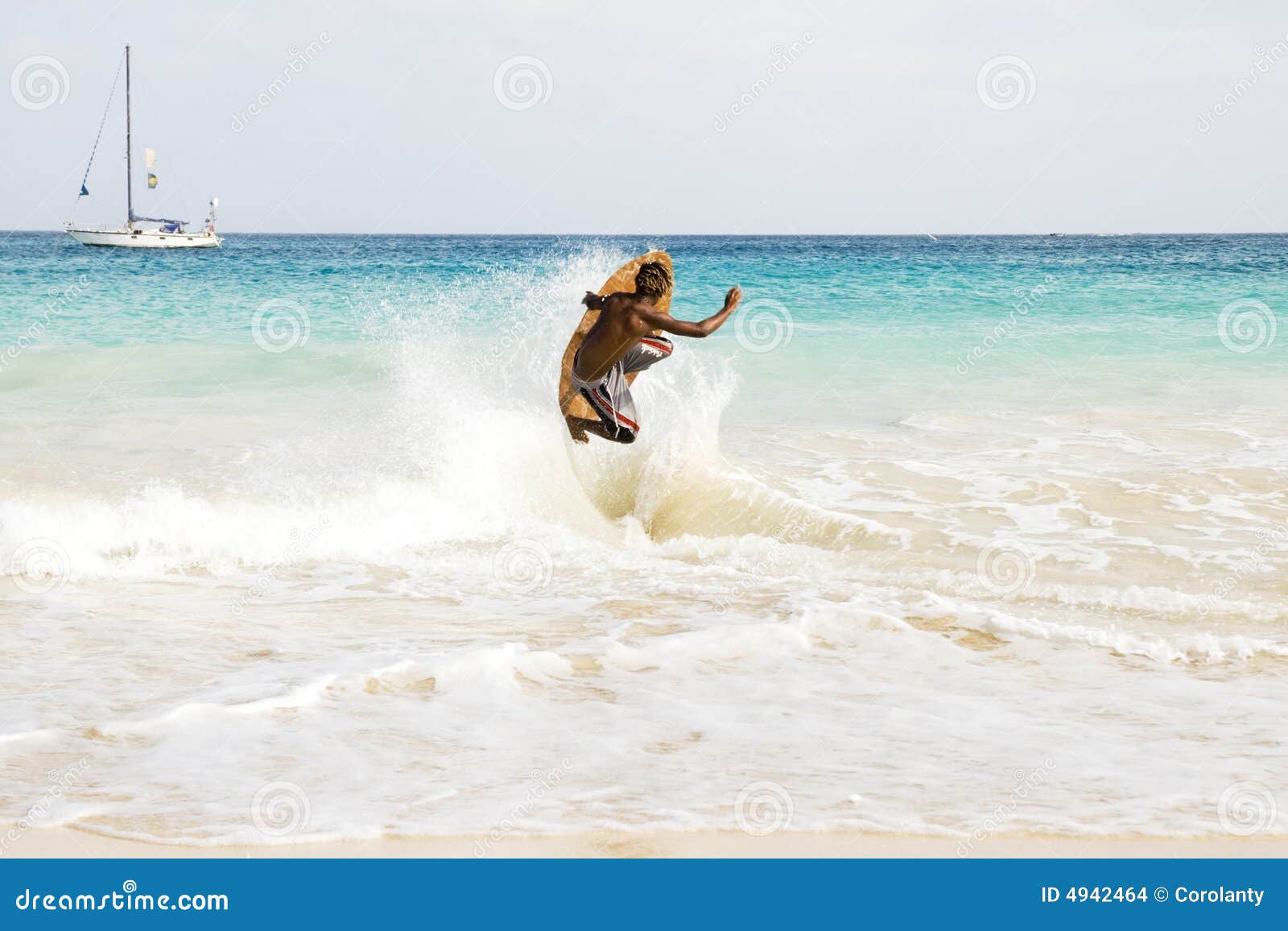 Skimboarder jumping wave. stock photo. Image of atlantic - 4942464