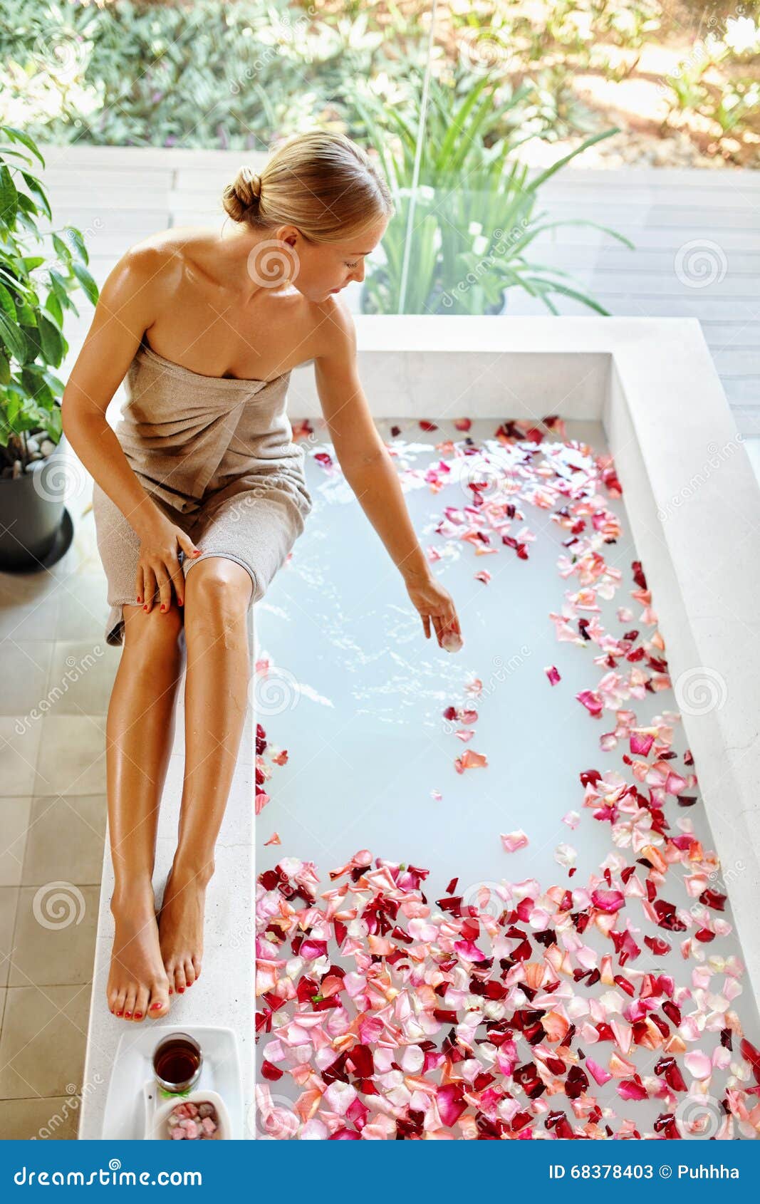 Skin Care Spa Treatment Woman On Bathtub Flower Rose Bath Stock