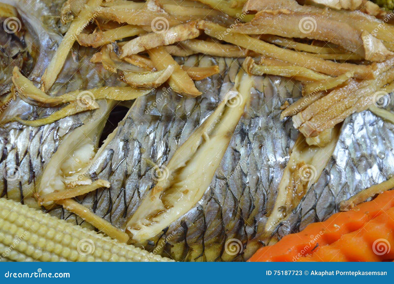 Skin of Steamed Mango Fish with Slice Ginger and Vegetable in Soy Sauce ...