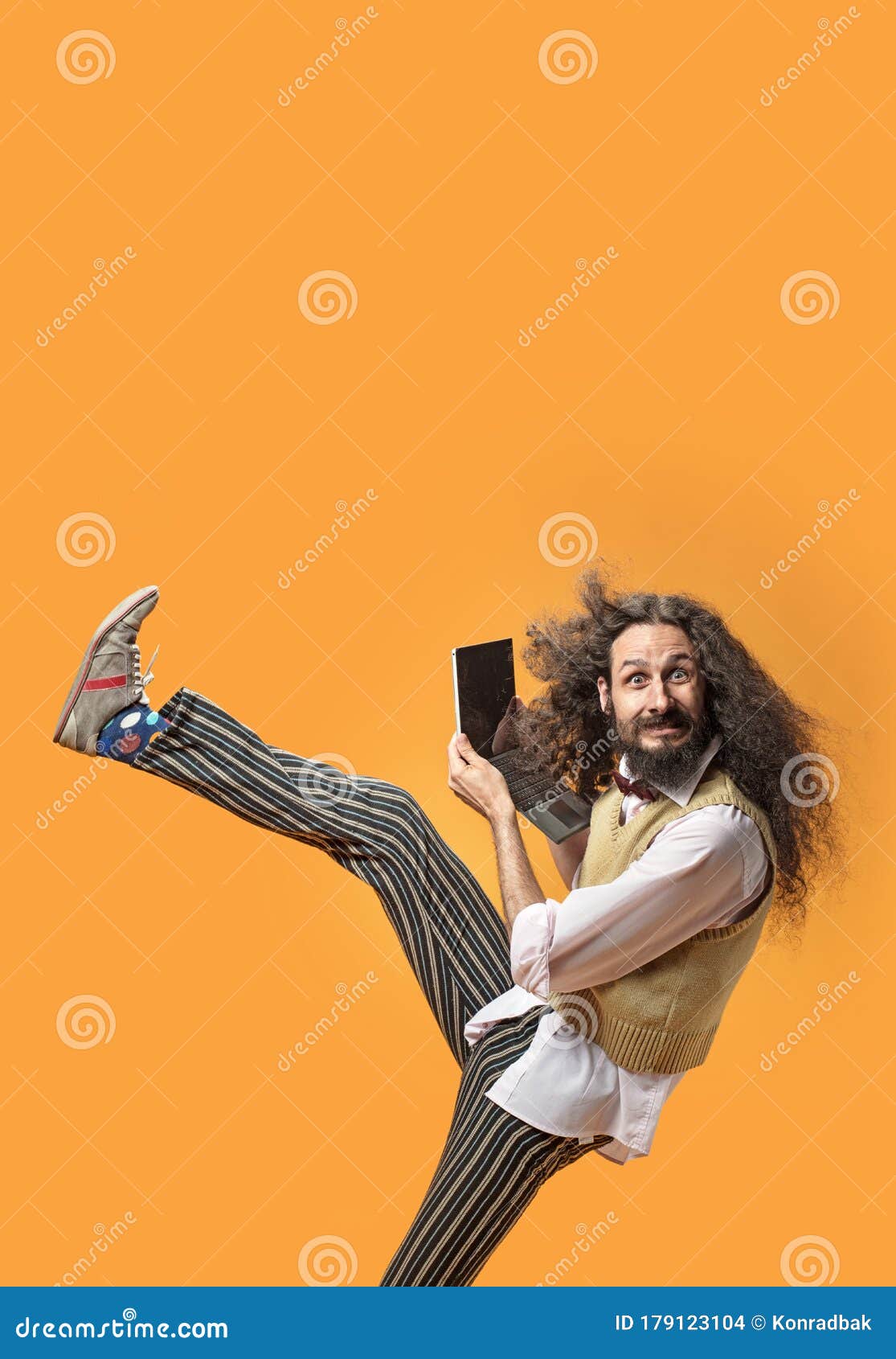 Skinny Nerd Jumping with a Notebook Stock Photo - Image of hacker ...