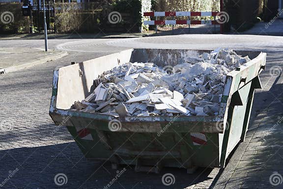 Skip with rubble stock image. Image of skip, residential - 53737695