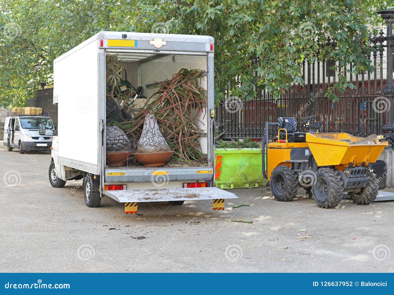 Skip and Truck stock photo. Image of plant, ramp, dumpster - 126637952