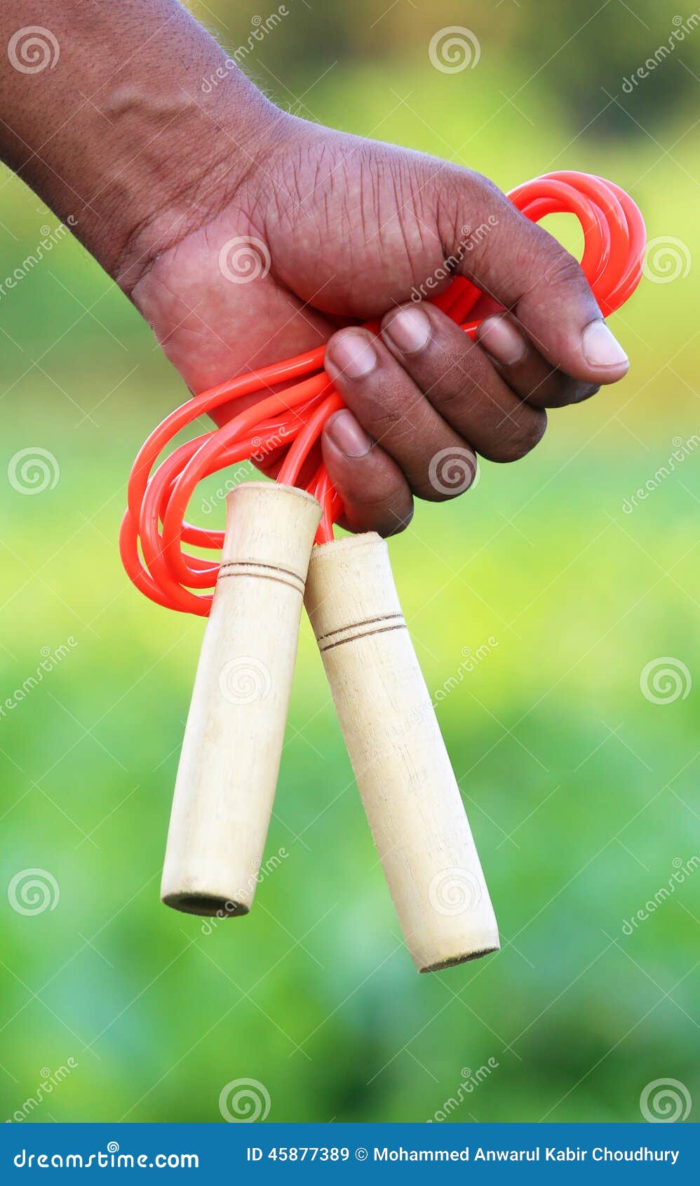 Skipping rope in hand stock image. Image of young, holding - 45877389