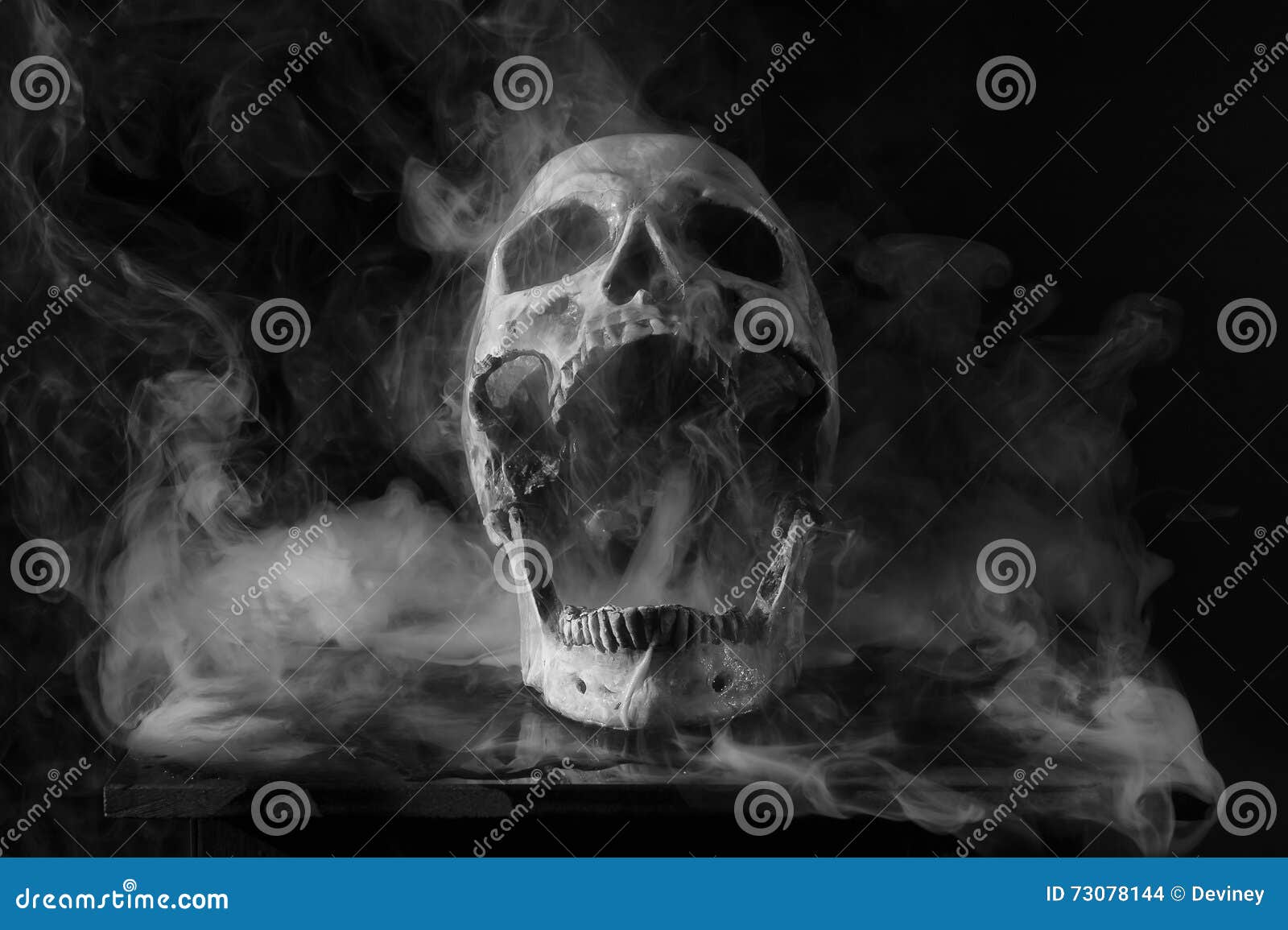 Skull in smoke stock photo. Image of mouth, holiday, eerie - 73078144