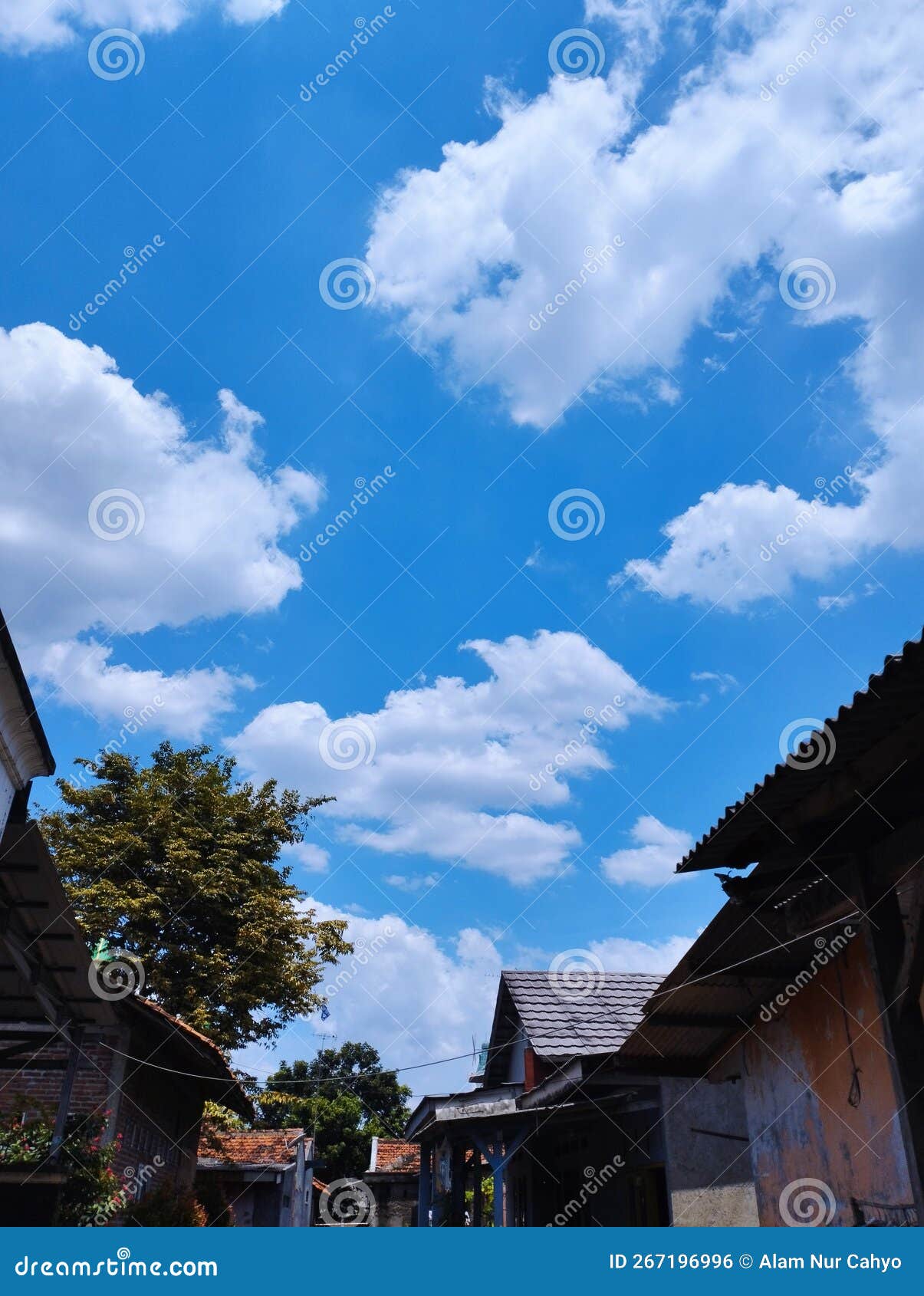 Sky and clouds at noon stock photo. Image of reflection - 267196996