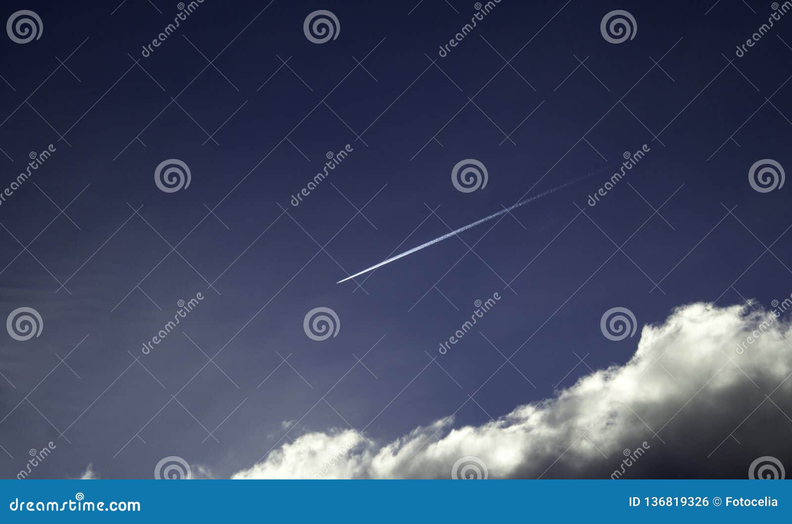 Sky with contrails stock photo. Image of contrails, plane - 136819326