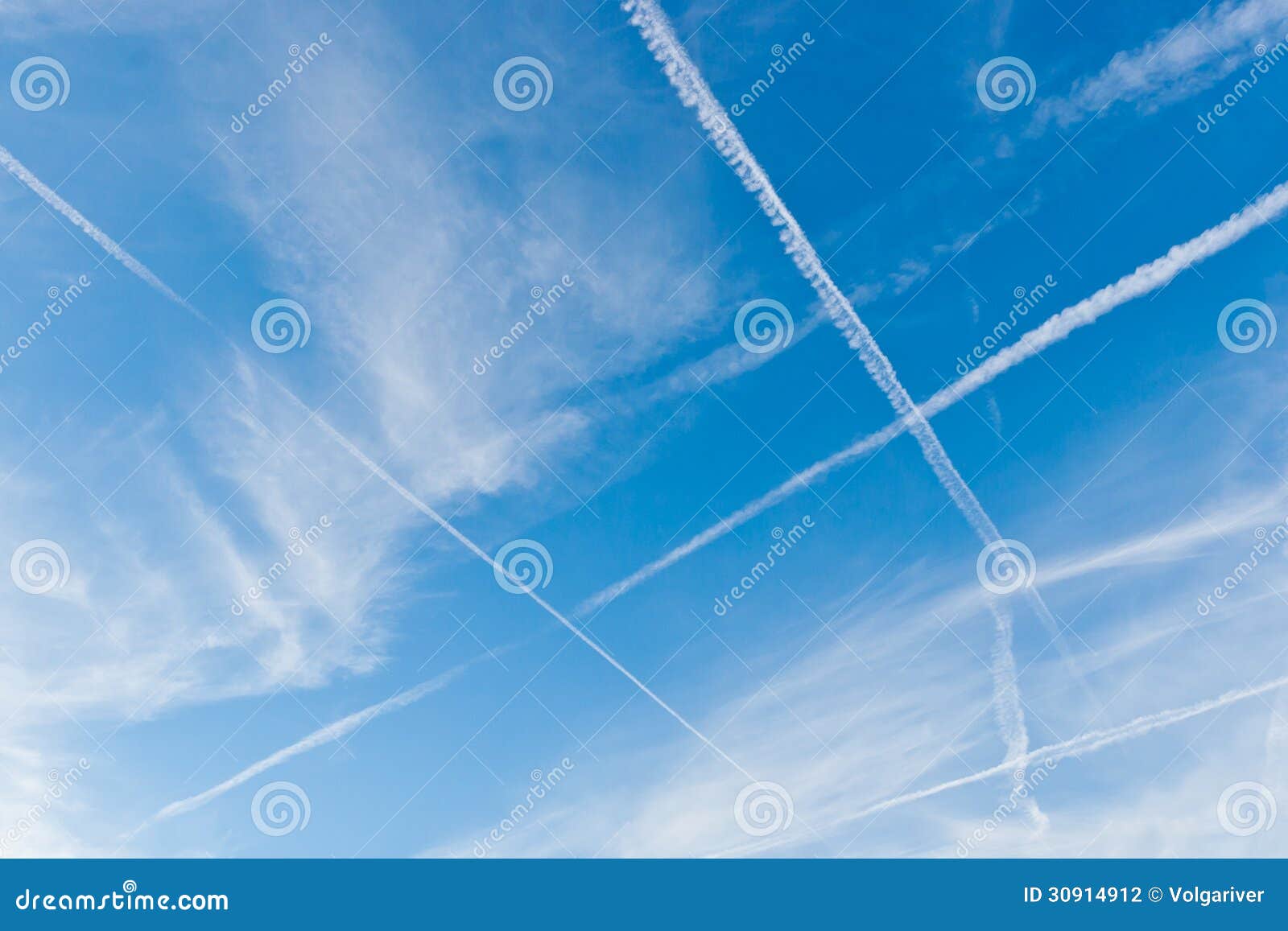Sky with Crossing Vapor Trails Stock Photo - Image of glow, color: 30914912