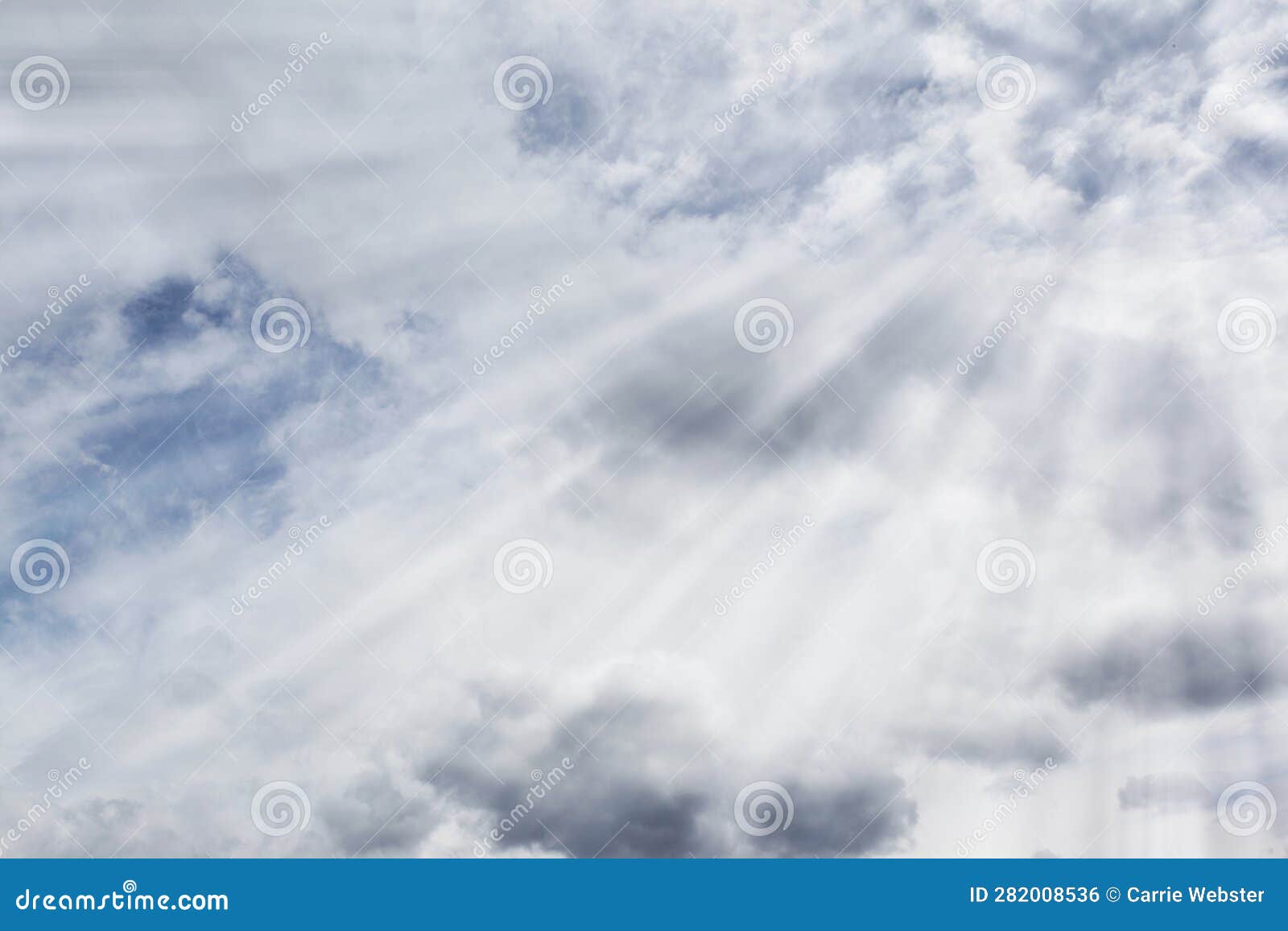 Rays of Light Piercing through Thick Layers of White Cloud Dispersed ...