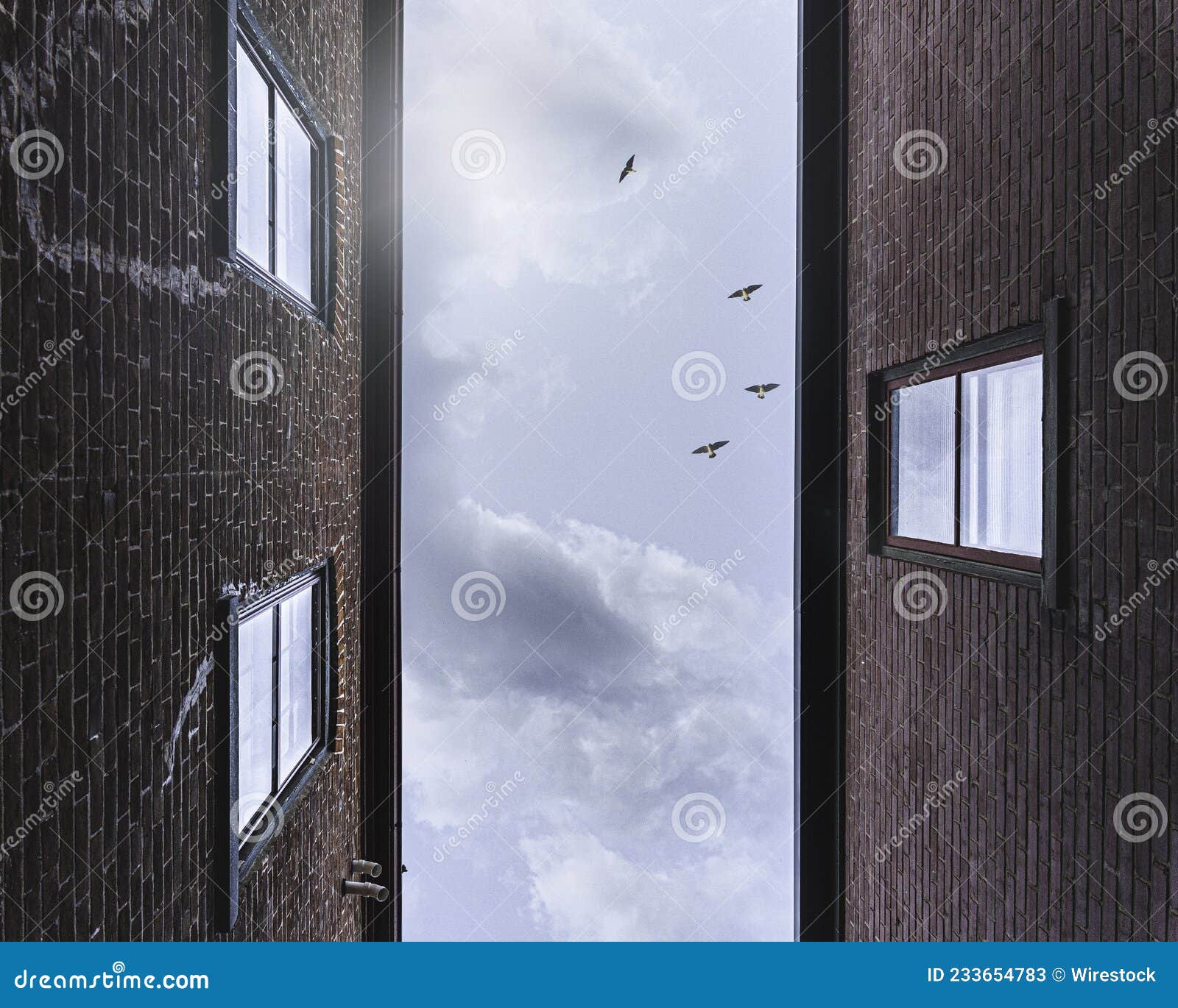 Sky with Flying Birds Visible between Brick Buildings Stock Image ...
