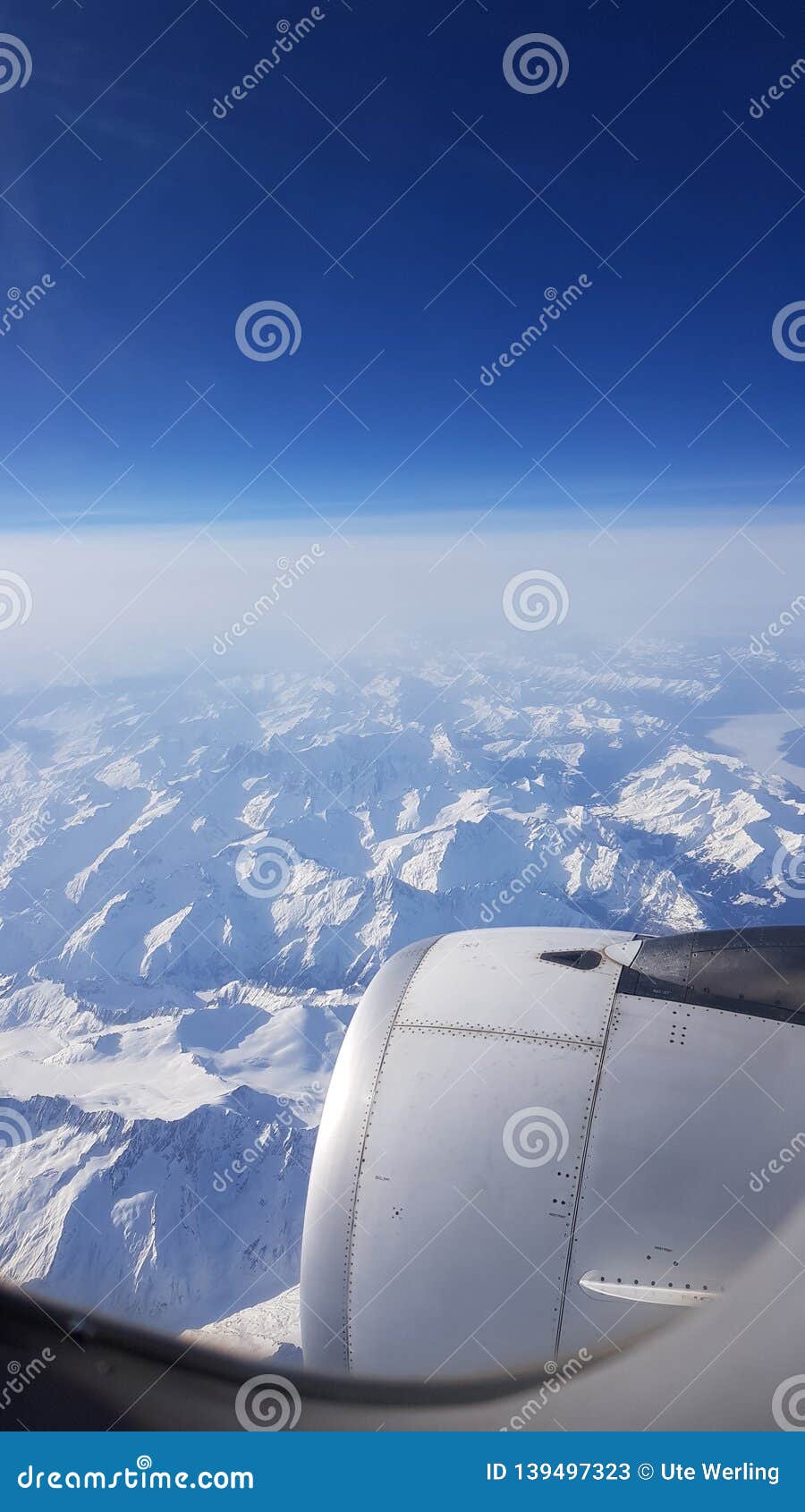 Sky outside plane stock image. Image of blue, mountain - 139497323