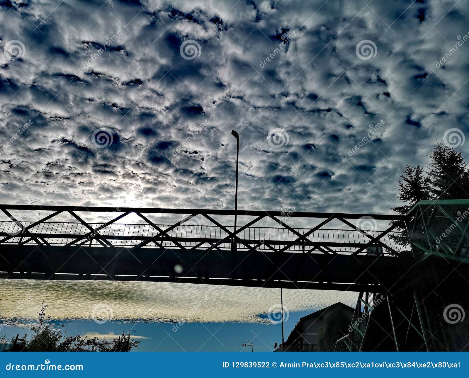 Sky over the bridge stock photo. Image of bridge, clouds - 129839522